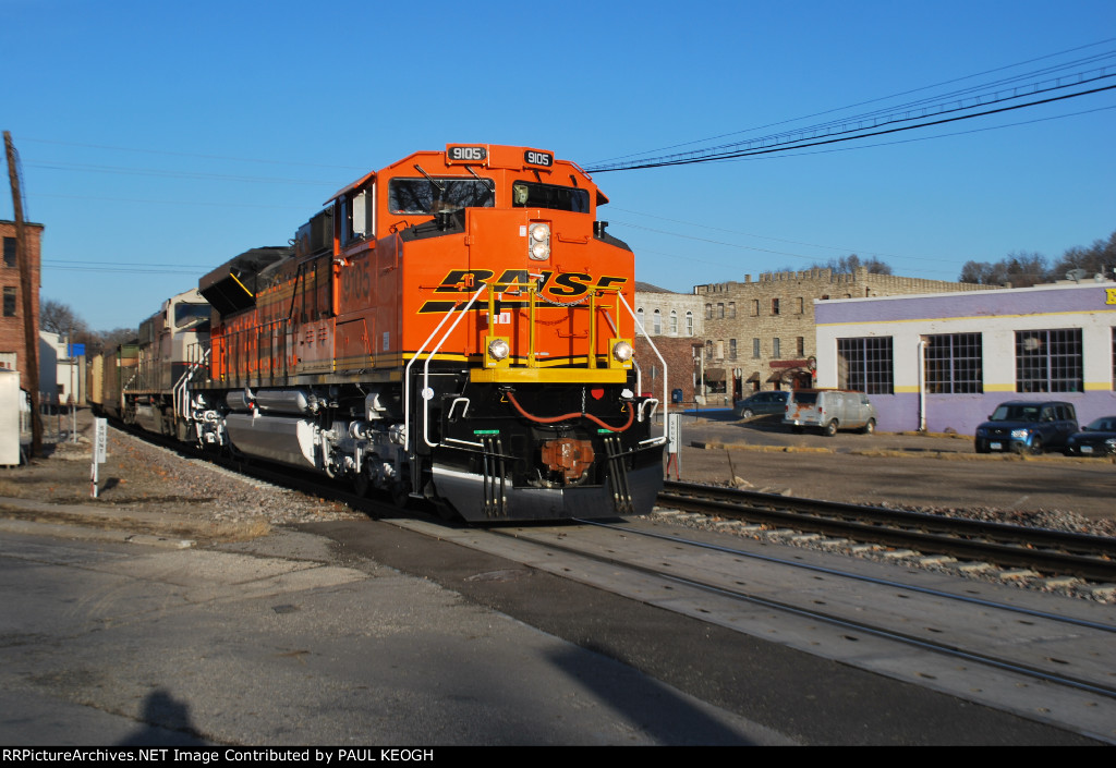 BNSF 9105 crosses the 8th Street crossing as she heads eastward with a Loaded Coal Train. (I ...